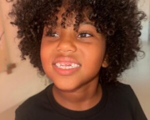 KIM KARDASHIAN'S KIDS FLASH BIG SMILES IN NEW PHOTOS CELEBRATING SAINT ...